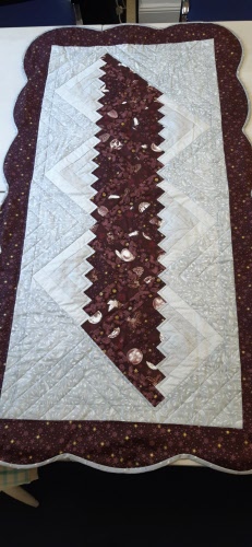 Log Cabin Table Runner, or Bed Footer, with wavy edges